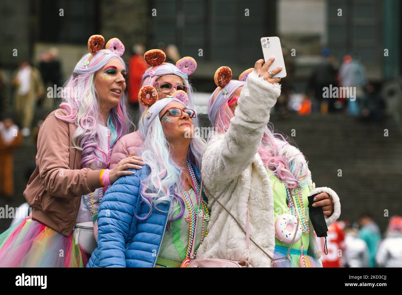 revellers are seen in front of Dom Cathedral during the women`s ...