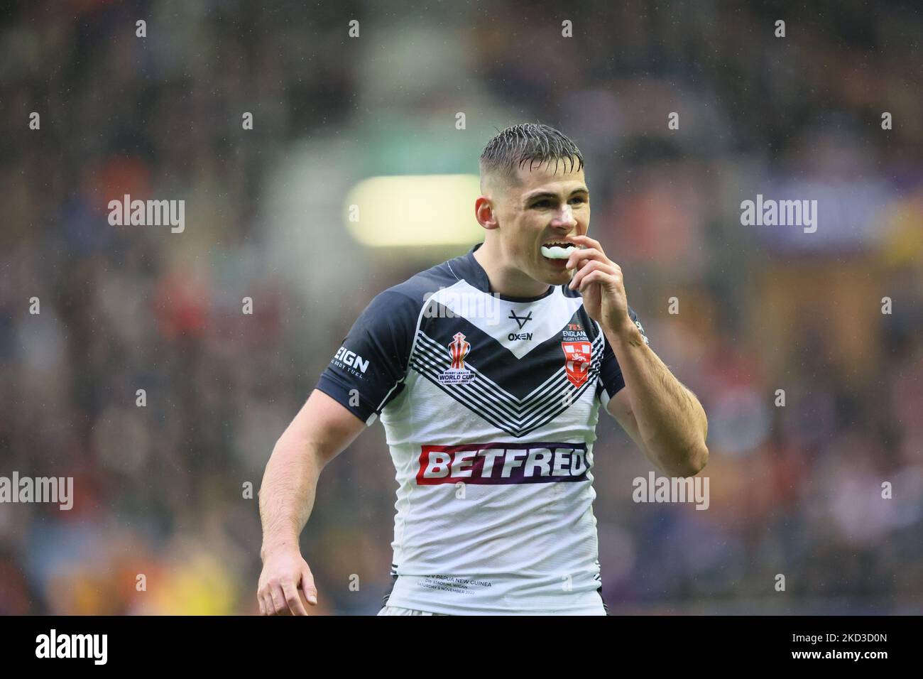 WIGAN, UK: Jack Welsby of England puts in his gumshield during the 2021 ...