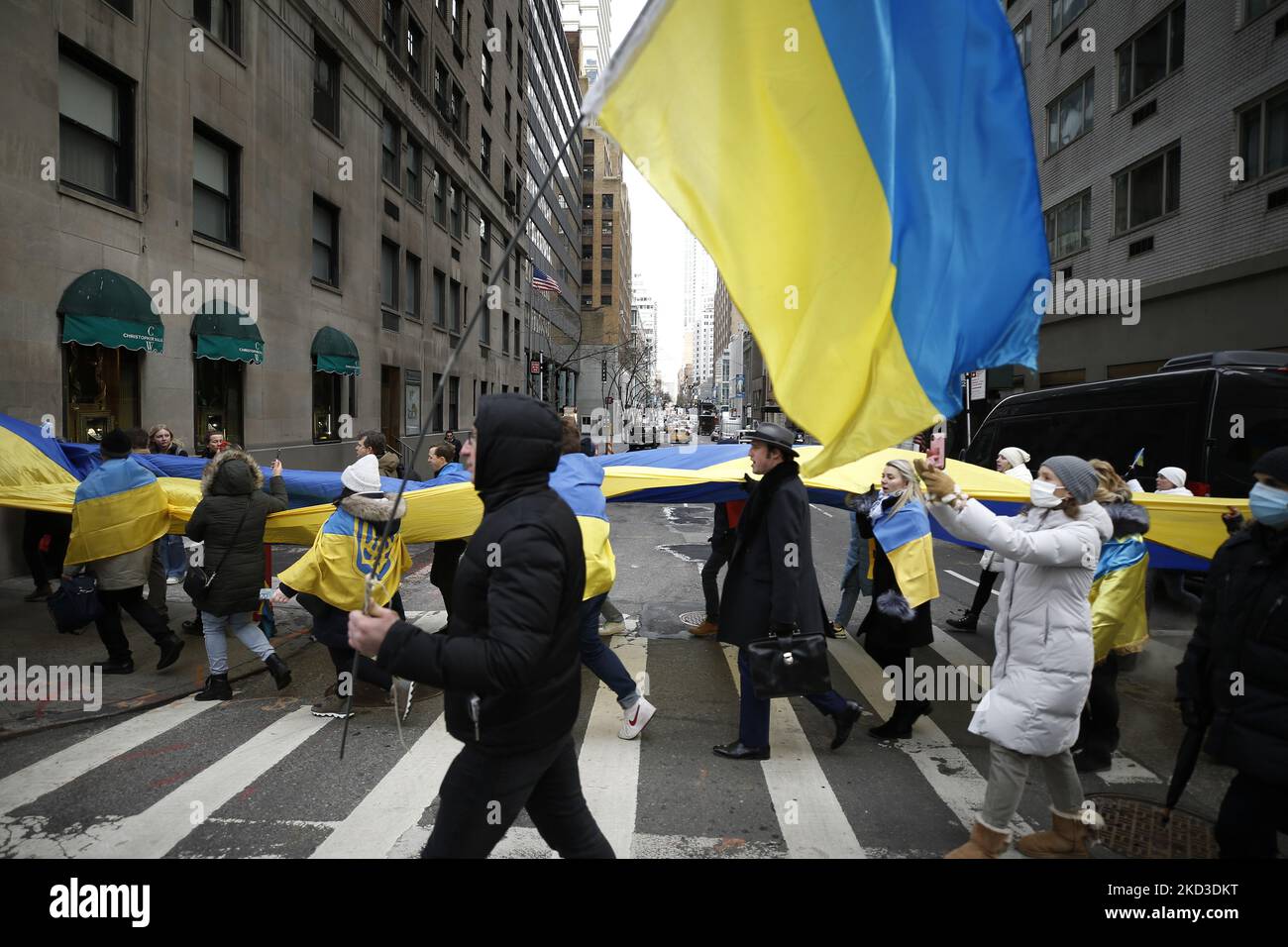 Supporters of the Ukraine march through the streets with flags and ...