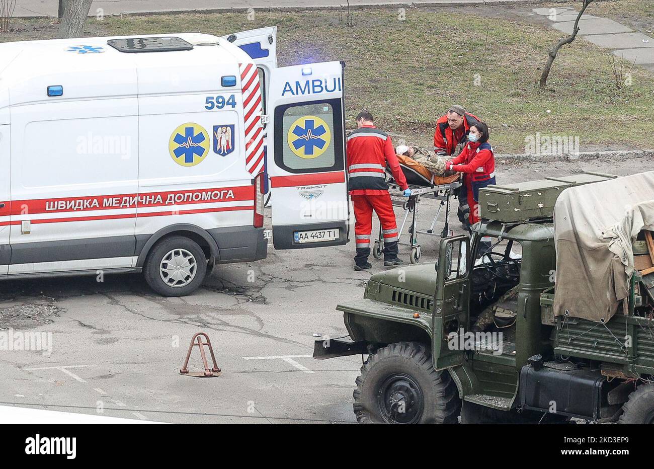Ambulance takes russian military wounded during the fight with ...