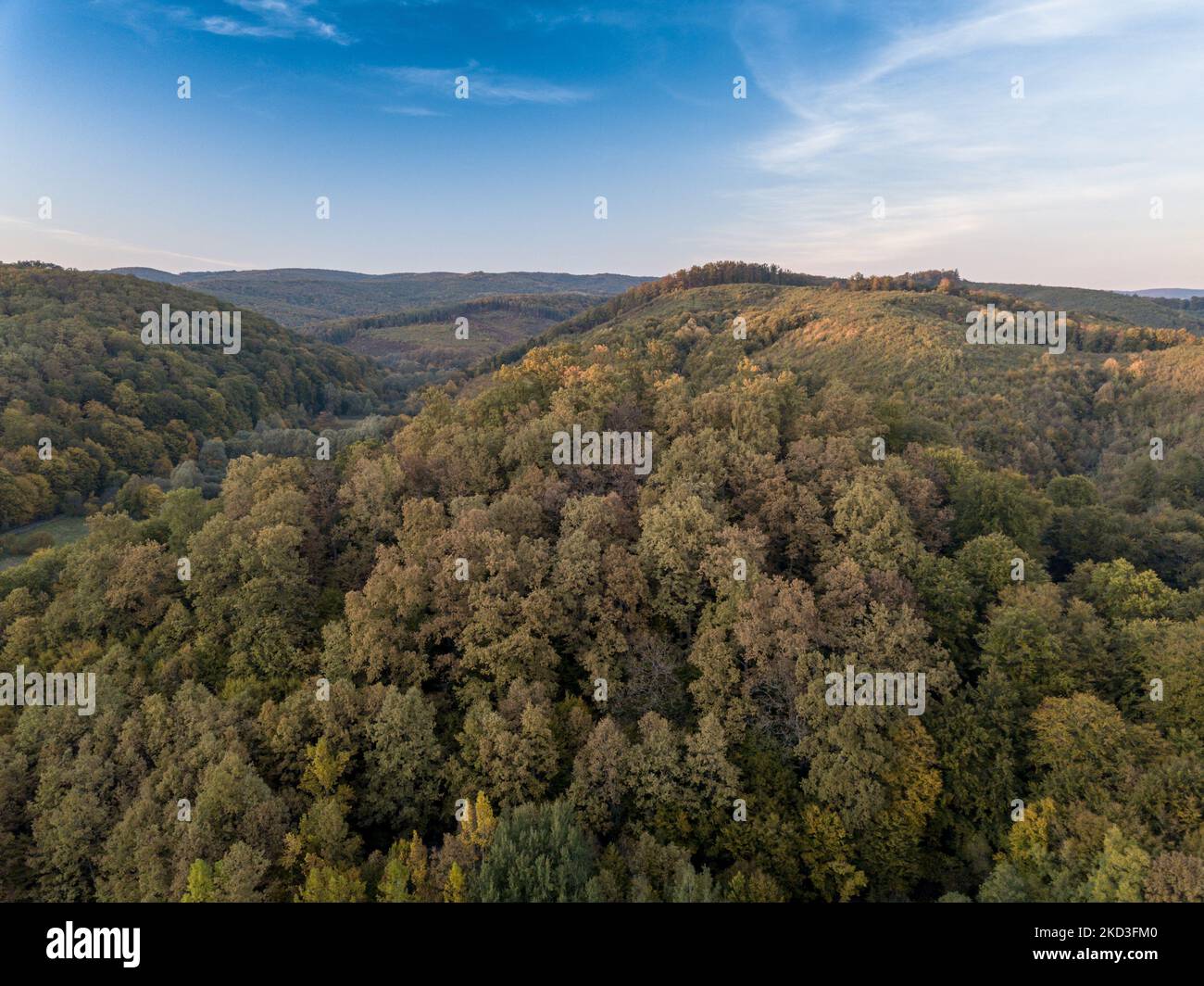 A beautiful view of cliffs landscape covered with greenery under blue ...
