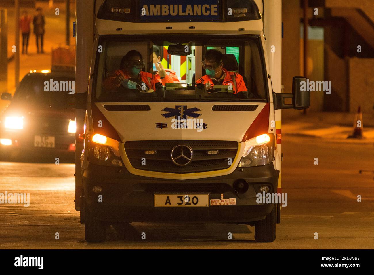 Paramedics in an ambulance in front of the Caritas Medical Centre ...