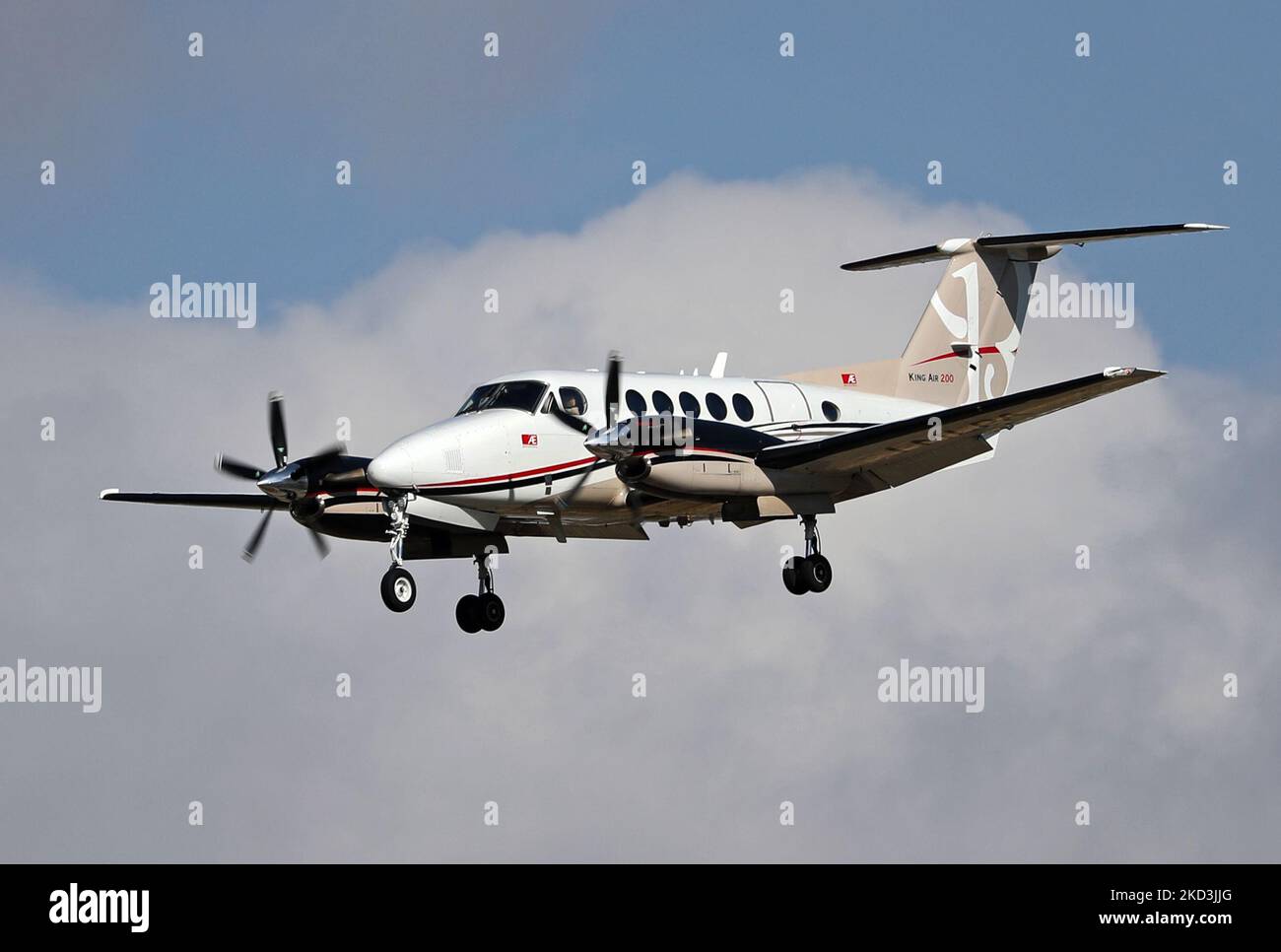 Beech 200 Super King Air, from private company, getting ready to land at Barcelona airport, in ...