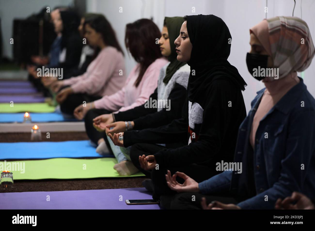 Palestinian women practise yoga during a therapy session at the first ...