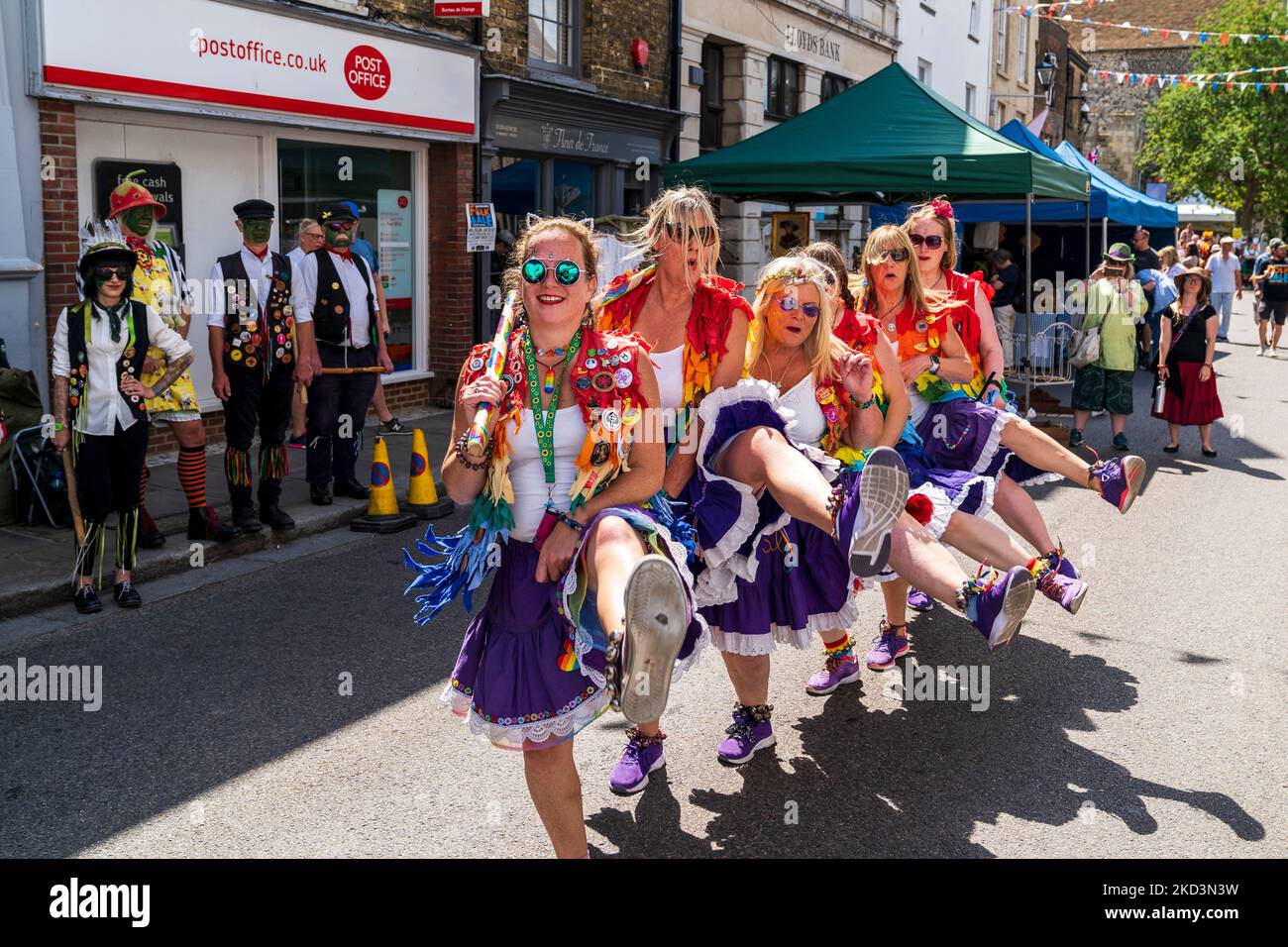 Traditional folk Morris dancers, the Loose Women Morris side, dancing ...