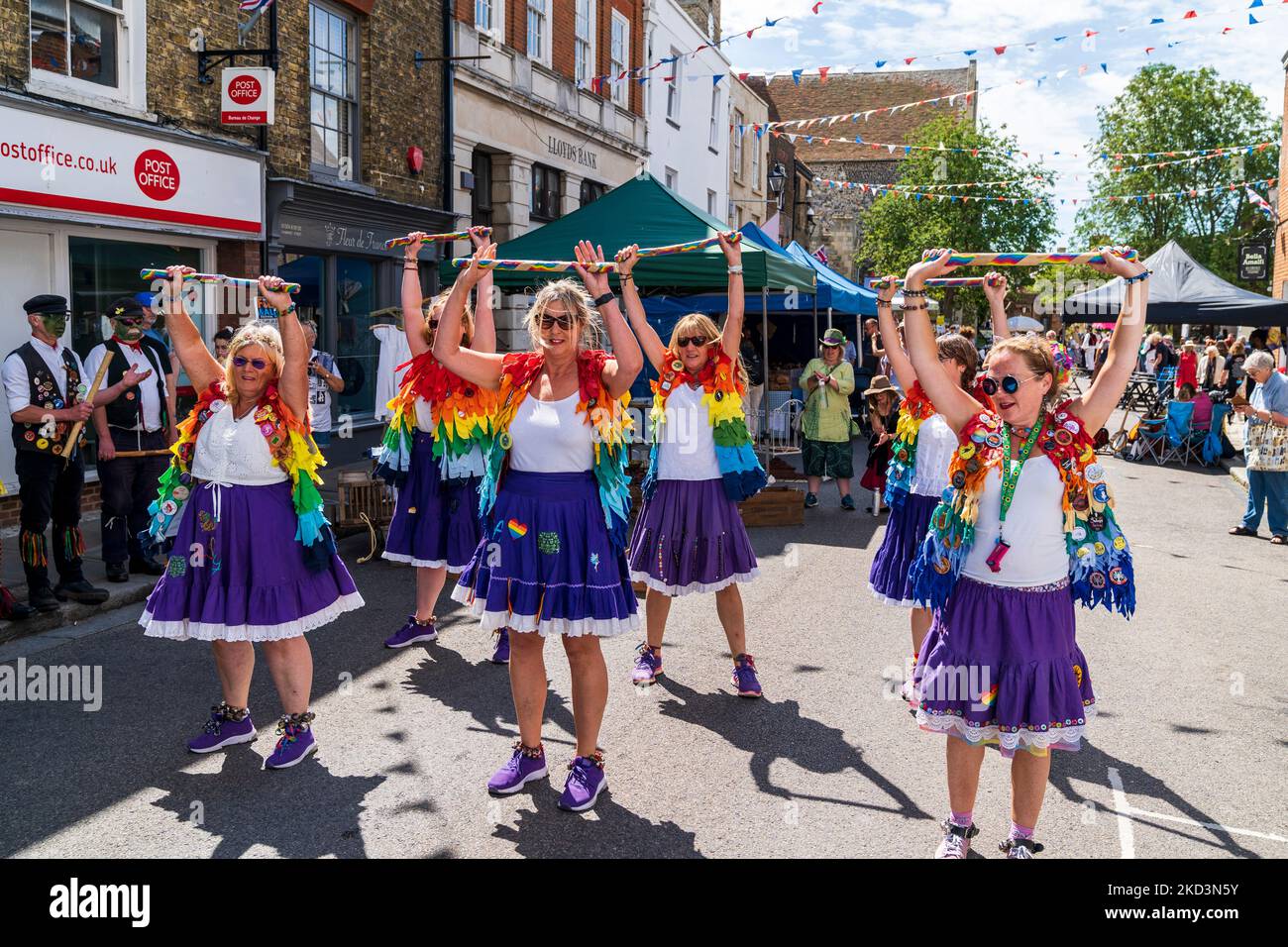 Traditional folk Morris dancers, the Loose Women Morris side, dancing ...