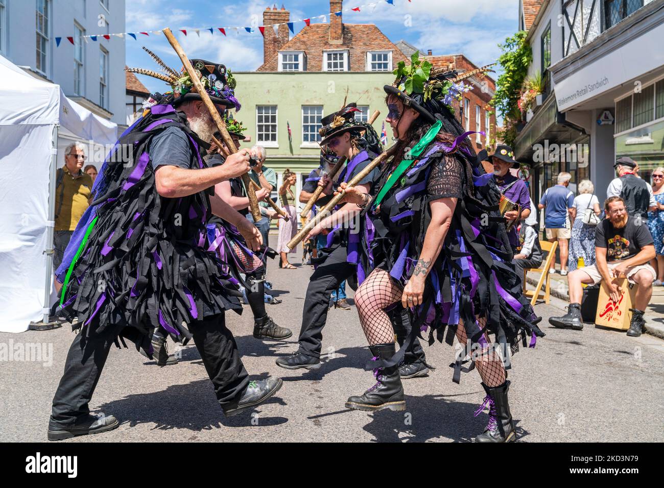Folk Morris dancers, the Black Swan Border Morris side, dancing in the ...