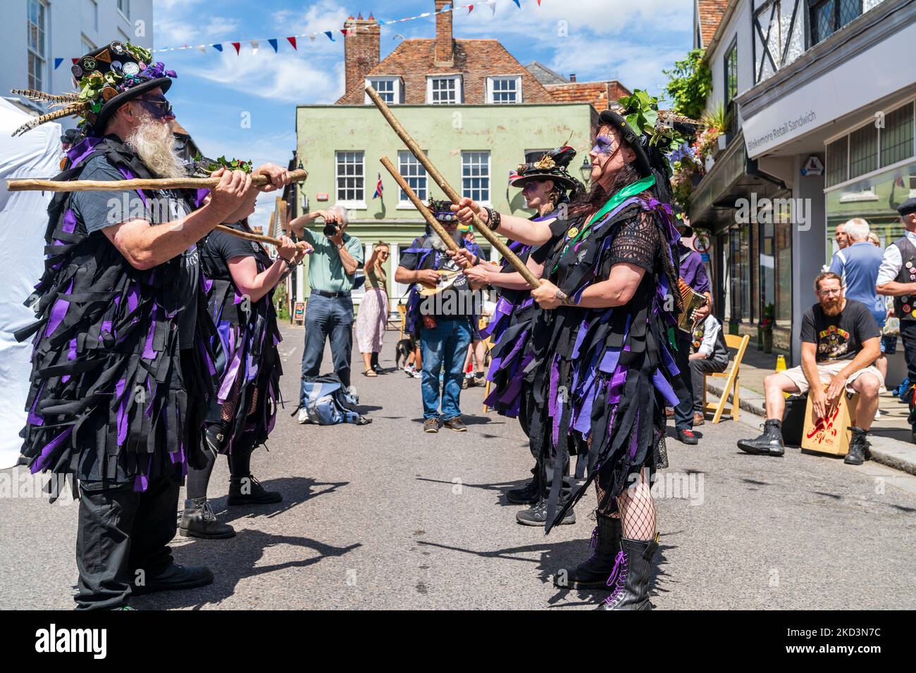Folk Morris dancers, the Black Swan Border Morris side, dancing in the ...