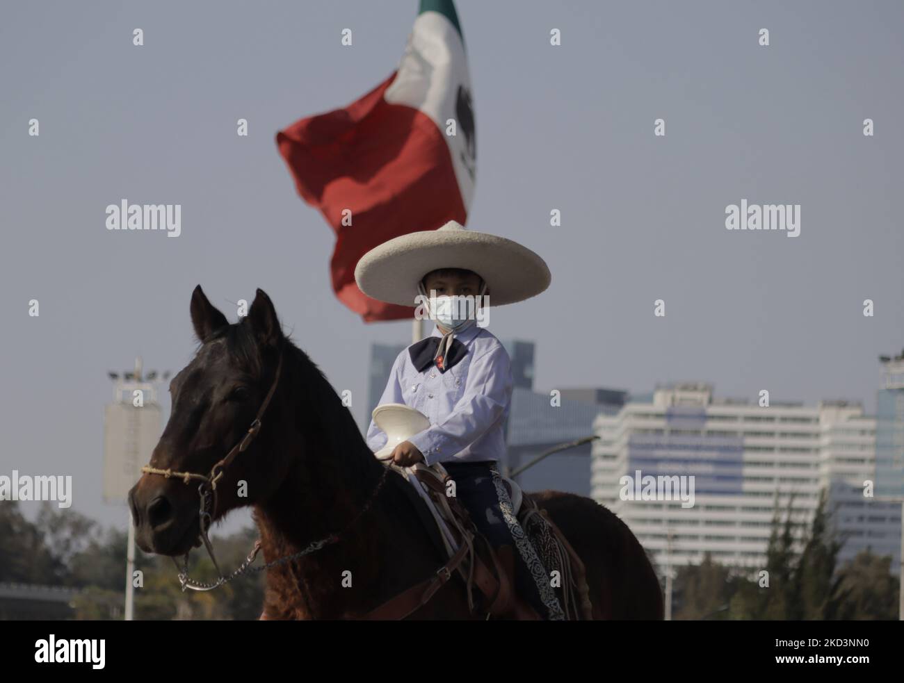 A charro riding a horse at the Hipódromo de Las Américas located in ...