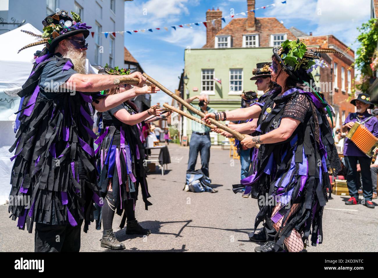 Folk Morris dancers, the Black Swan Border Morris side, dancing in the ...