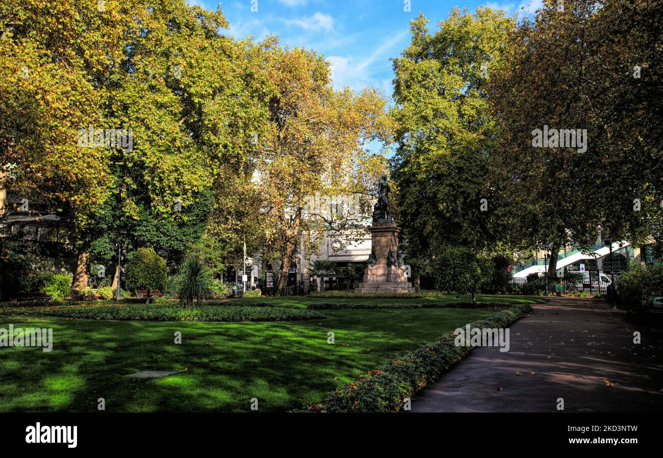 The statue of Sir James Outram with a cloudy blue sky in the background ...
