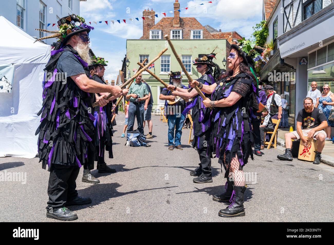 Folk Morris dancers, the Black Swan Border Morris side, dancing in the ...