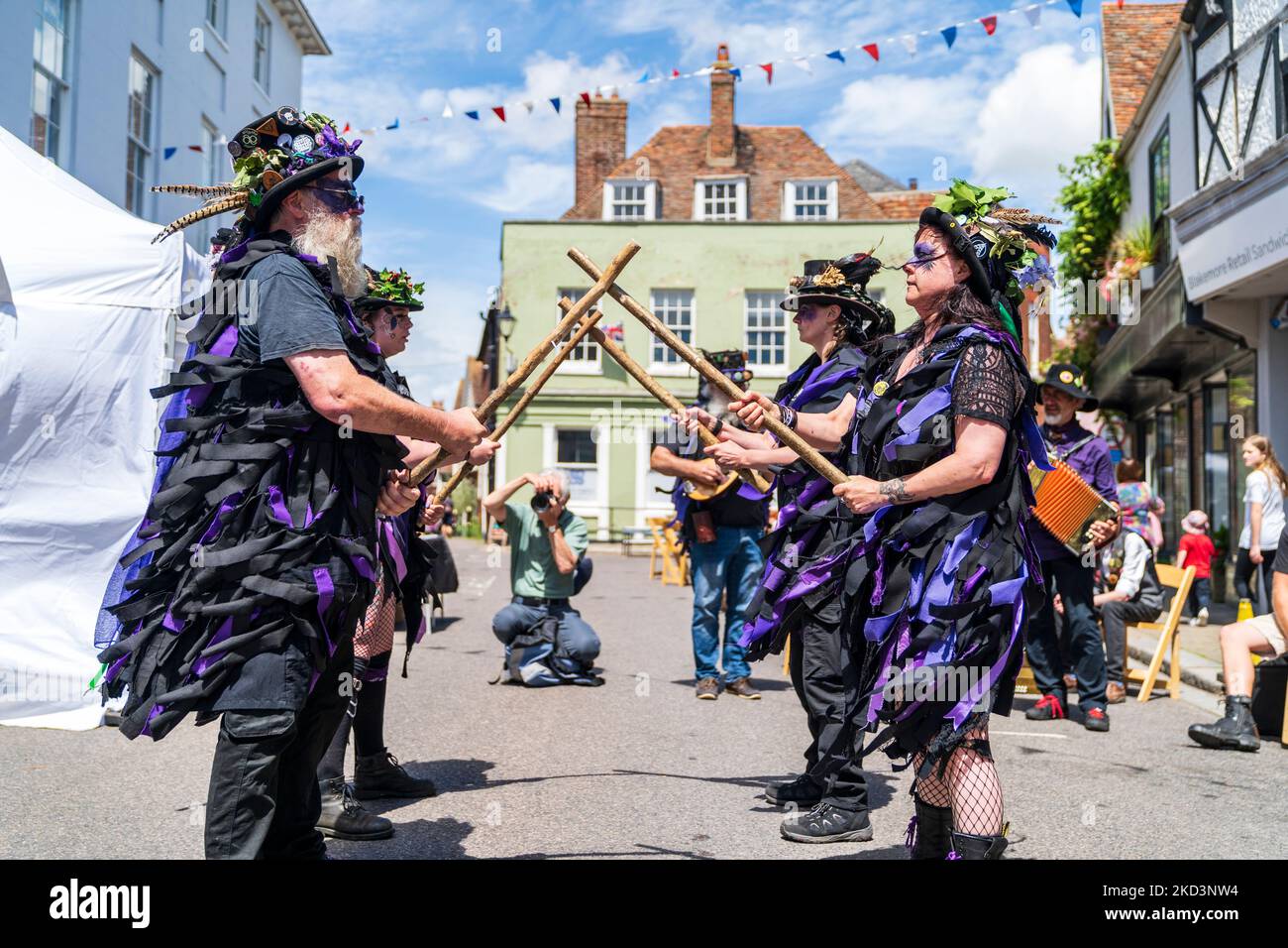 Folk Morris dancers, the Black Swan Border Morris side, dancing in the ...
