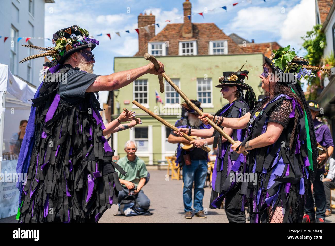 Folk Morris dancers, the Black Swan Border Morris side, dancing in the ...