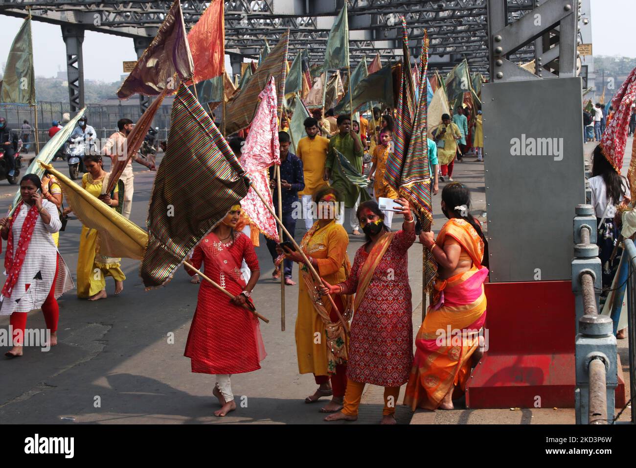Hindu Devotees activists take part in a religious rally walk past ...