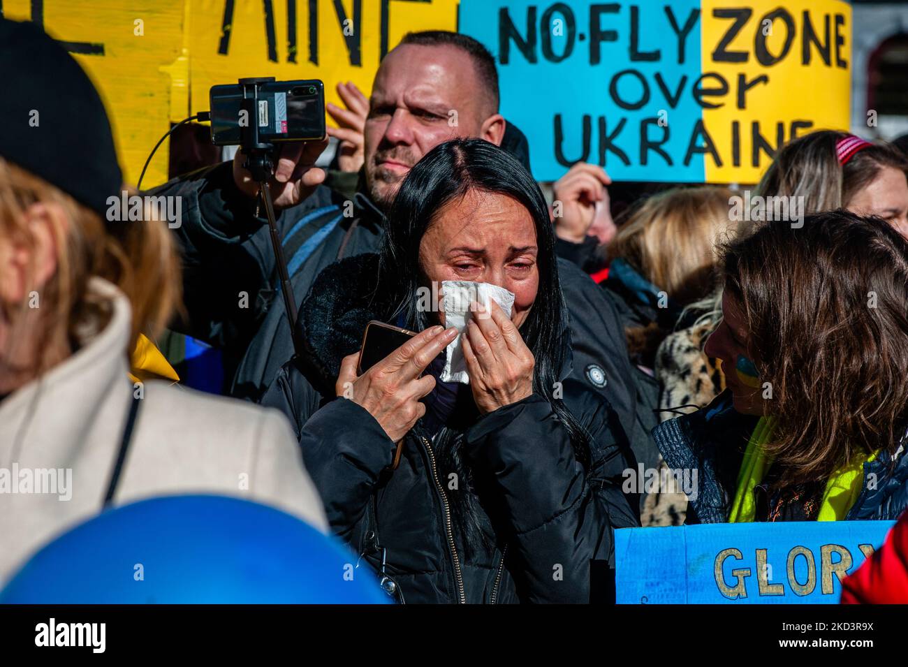 An Ukrainian woman is crying, during the massive demonstration against ...