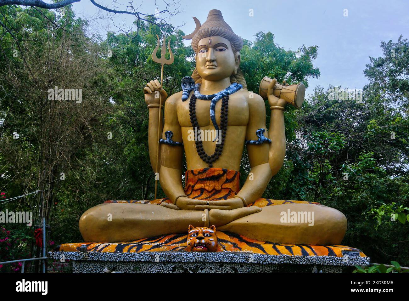 Large statue of the Lord Shiva on the grounds of the Sri Laxmi Ashram ...