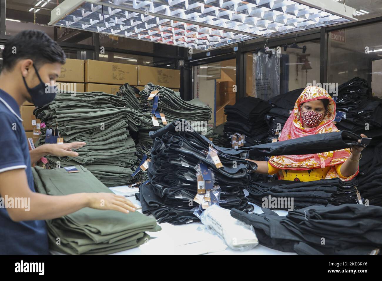 Ready-made garments worker works in a garments factory in Dhaka ...