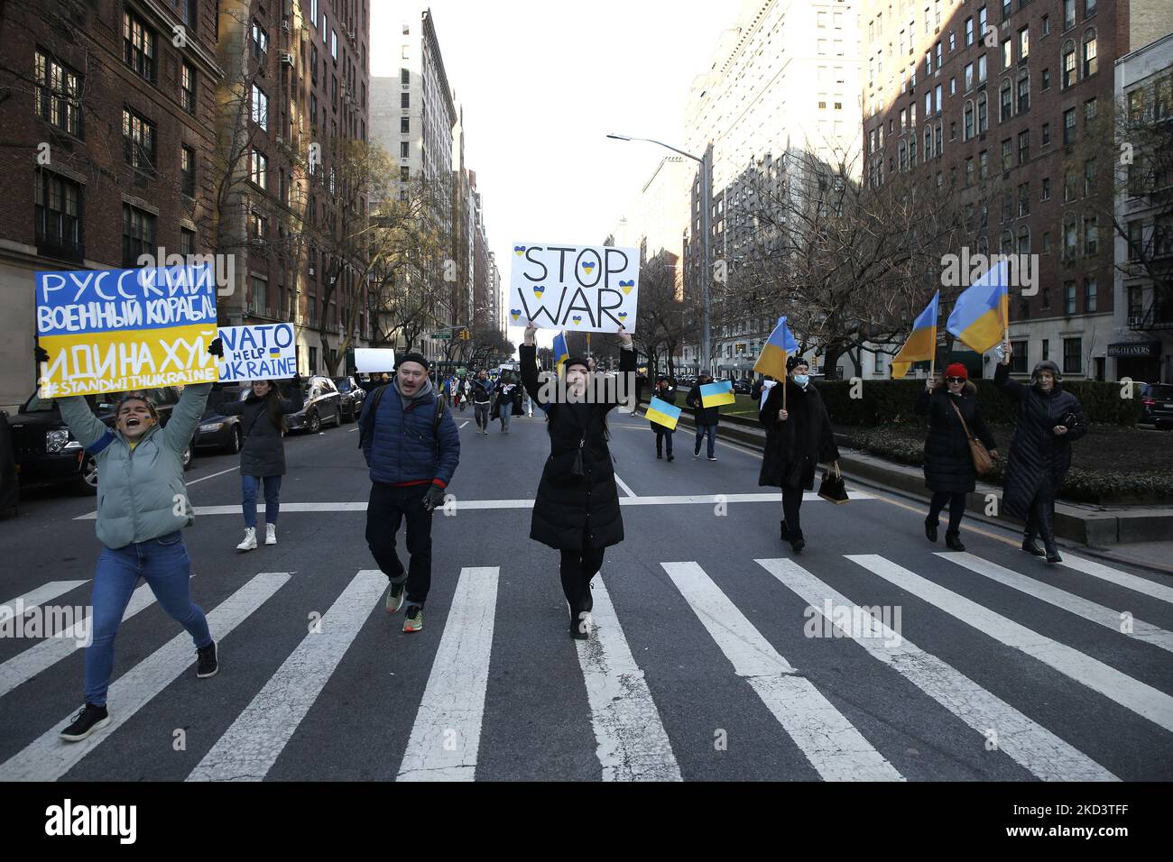 Ukraine supporters march through the Upper East Side chanting slogans ...