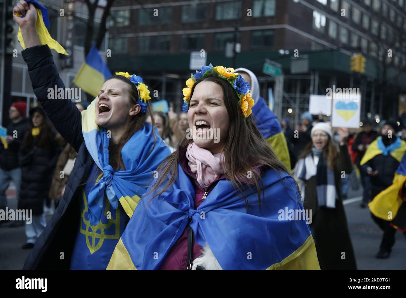 Ukraine supporters march through the Upper East Side chanting slogans ...