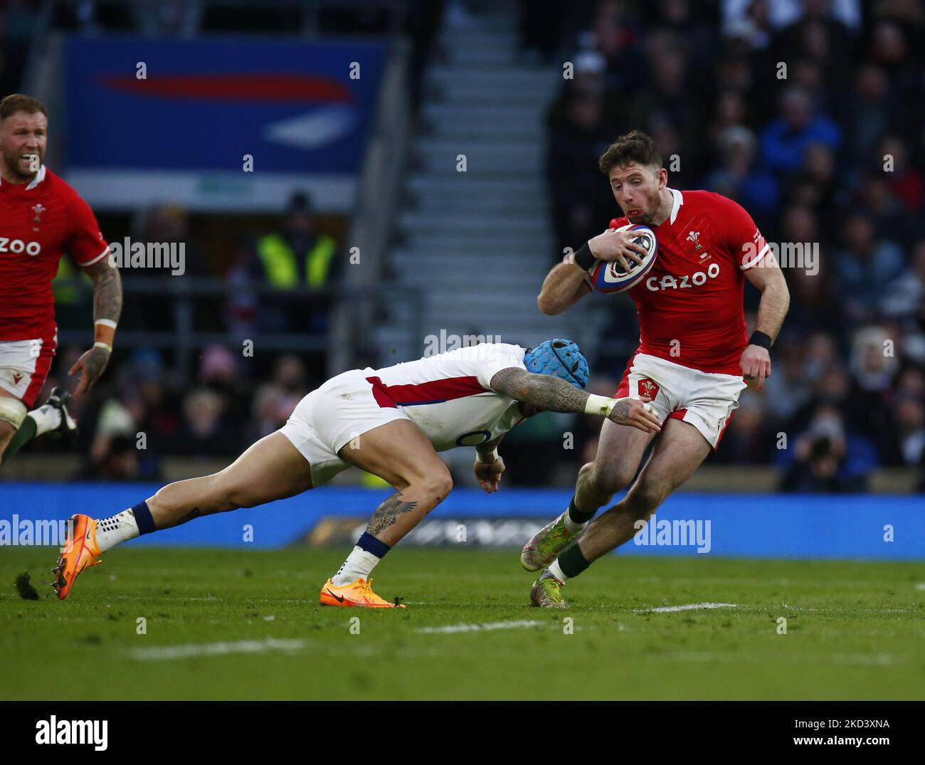 Alex Cuthbert of Wales makes his 50th cap for Wales gets tackled by ...