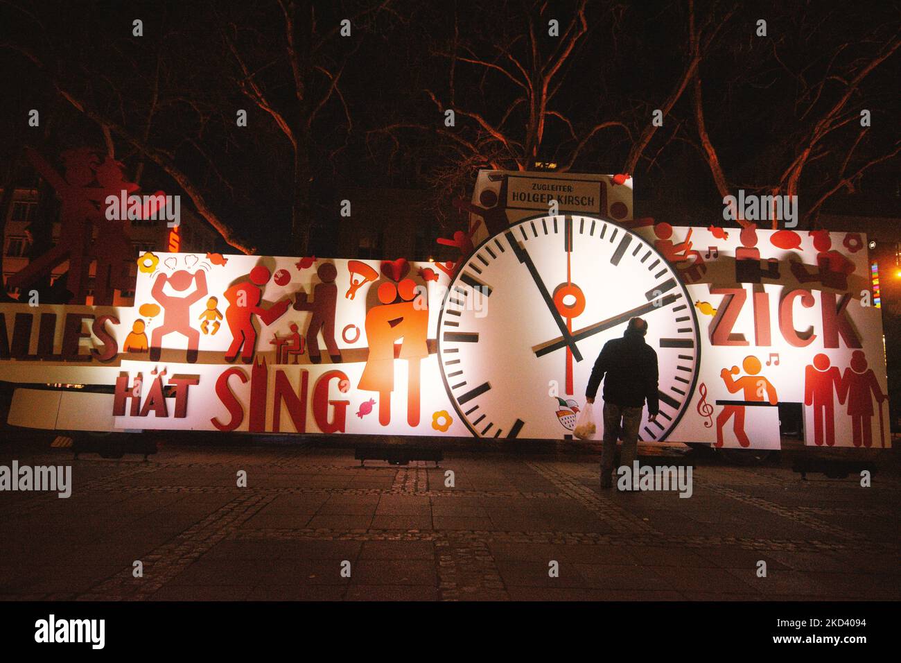 a Carnival float is illuminated in the city center of Cologne, Germany ...
