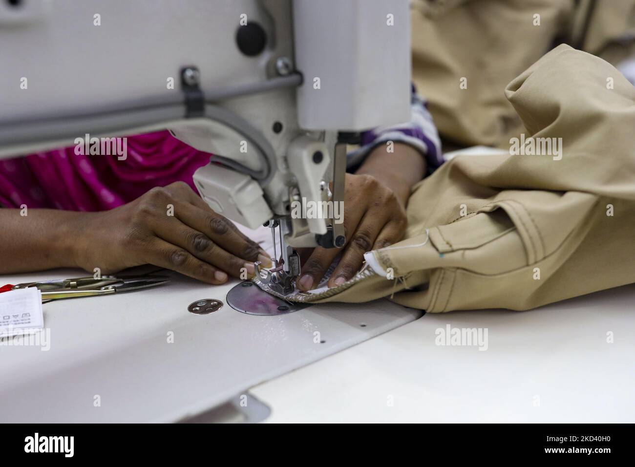 Ready-made garments worker works in a garments factory in Dhaka ...