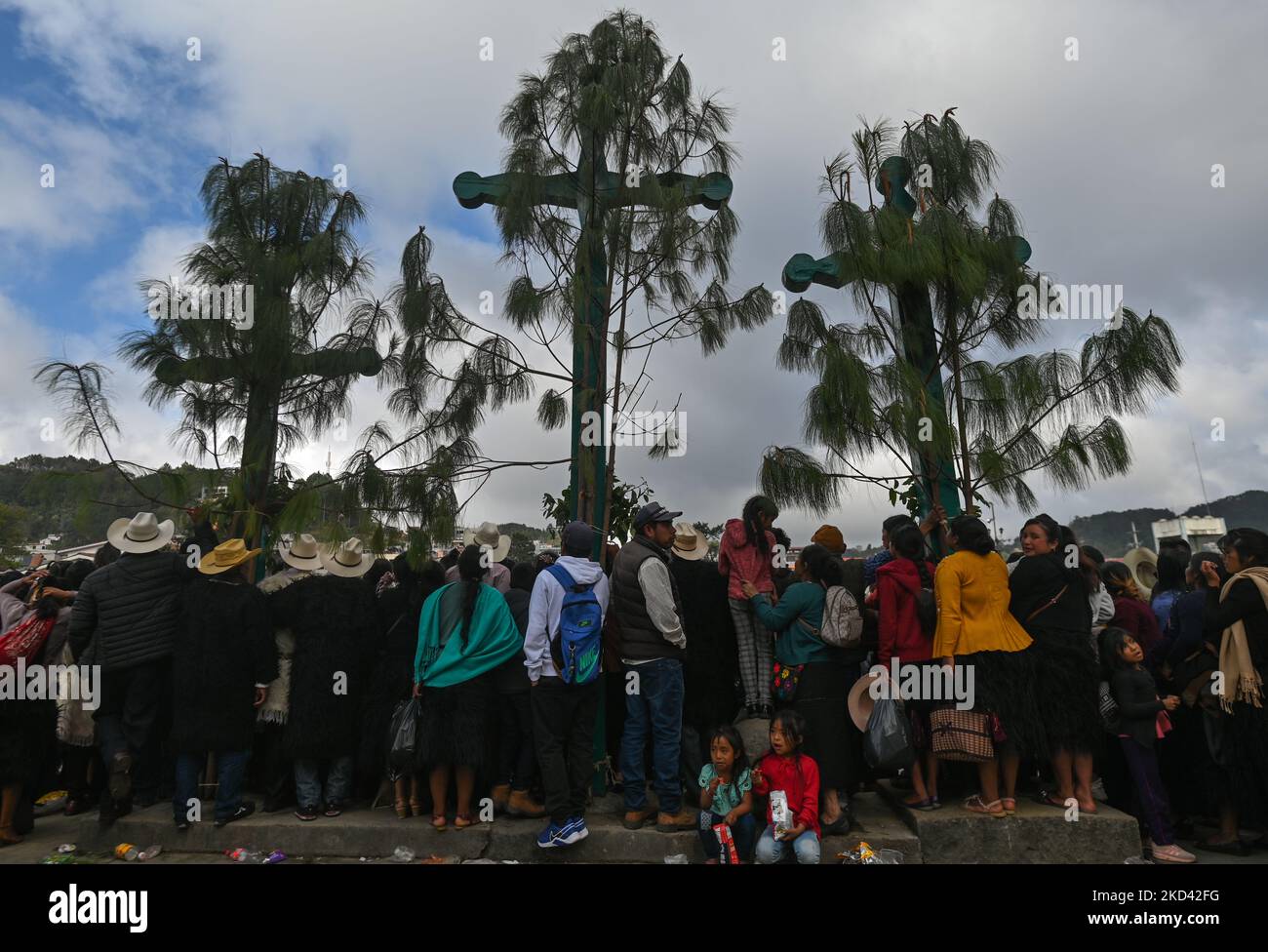 Locals watch bull running through the streets of San Juan Chamula on ...
