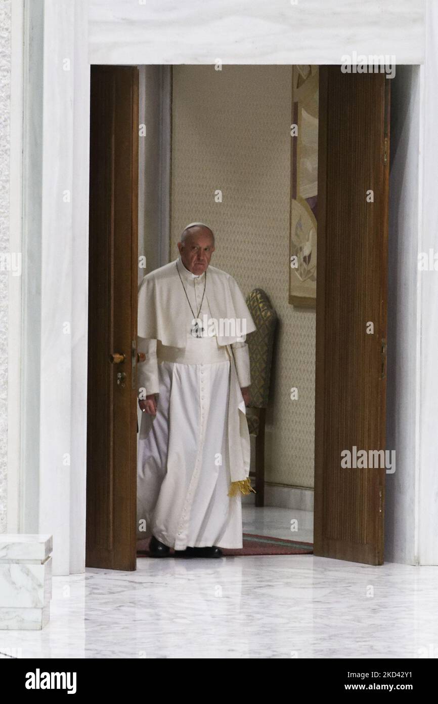 Pope Francis arrives in the Paul VI hall to meet with faithful during ...