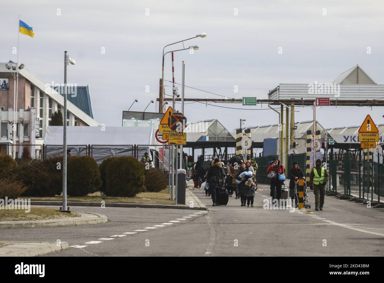 People fleeing from Ukraine are seen after crossing Ukrainian-Polish ...