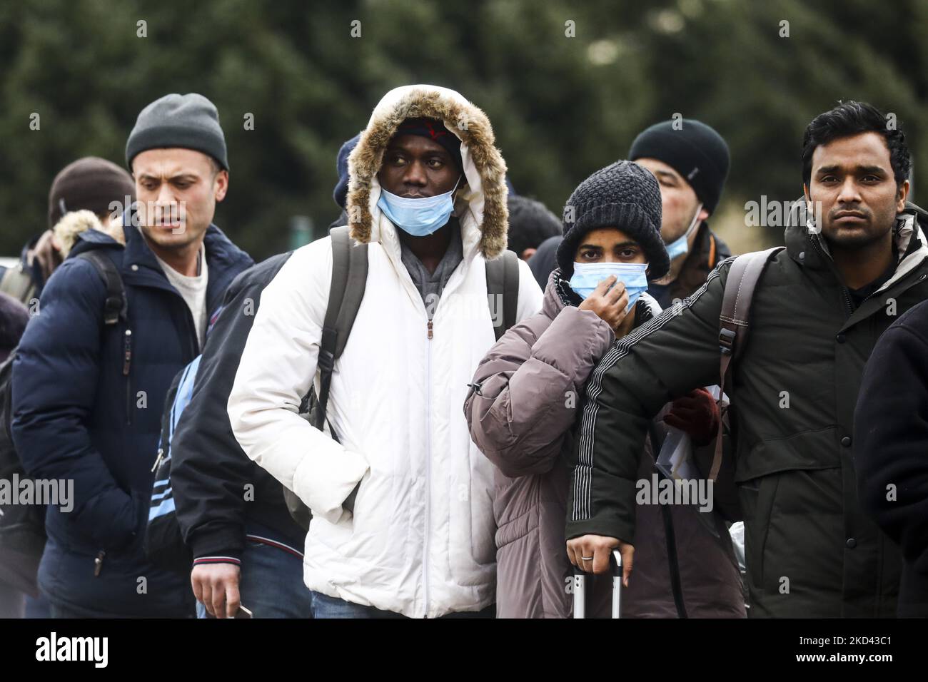 People fleeing from Ukraine are seen after crossing Ukrainian-Polish ...