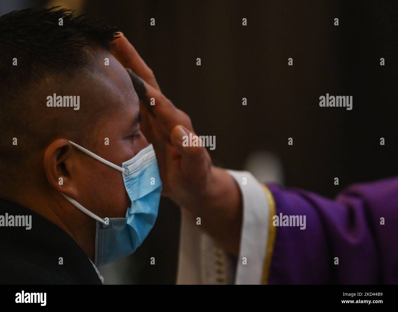Cardinal Álvaro Ramazzini makes the sign of the cross with ashes on the ...