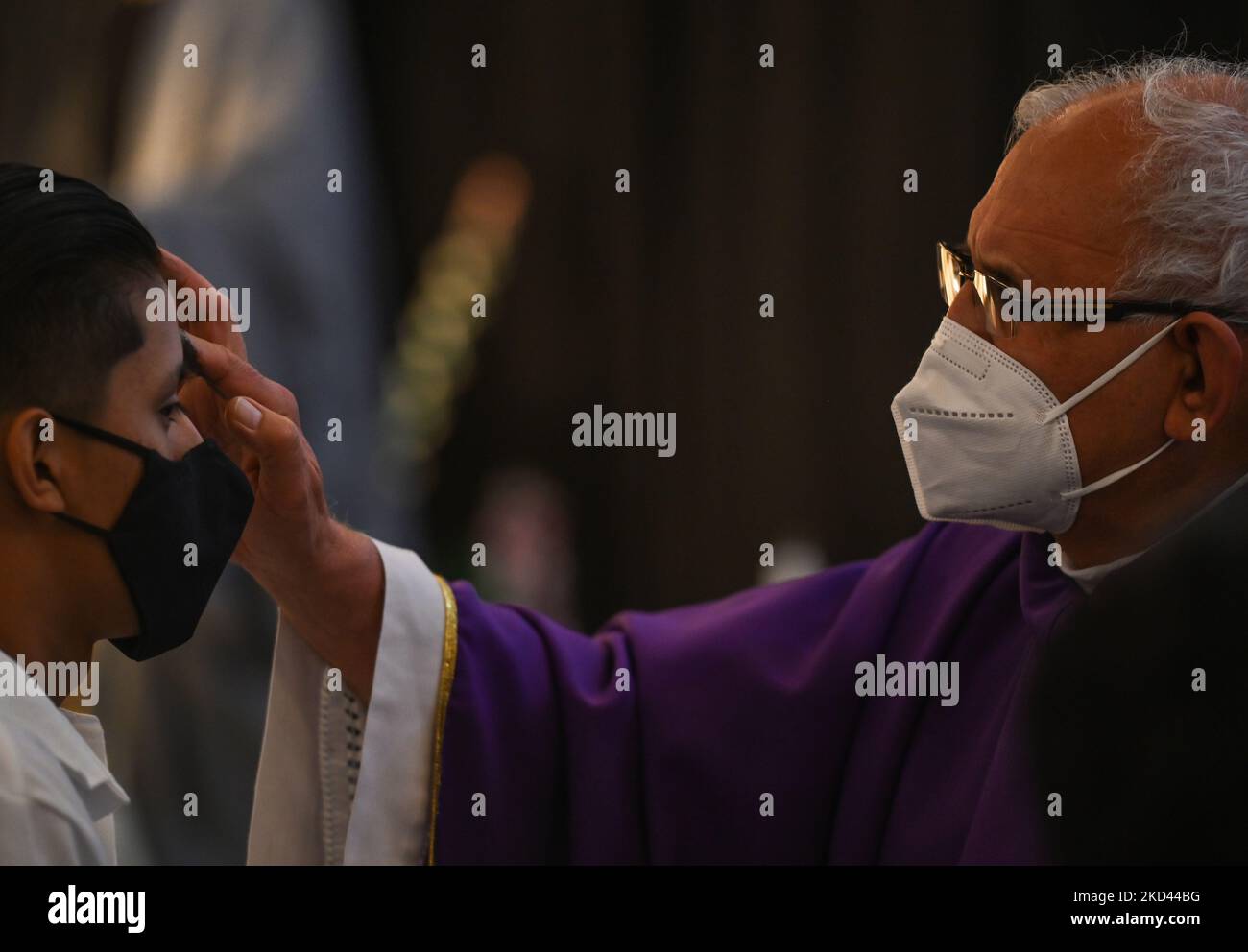 Cardinal Álvaro Ramazzini makes the sign of the cross with ashes on the ...