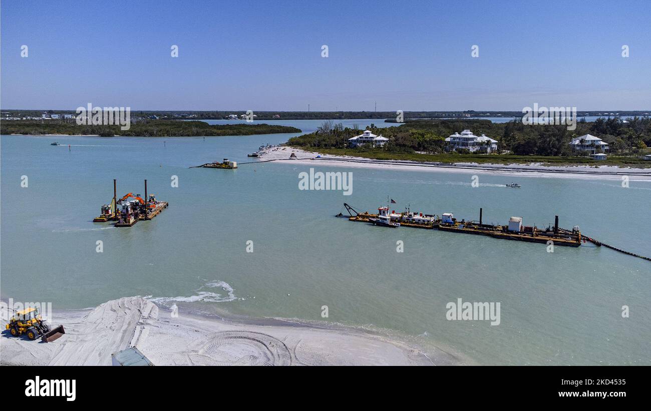 Barges are in place to dredge Stump Pass between Stump Pass Beach State ...