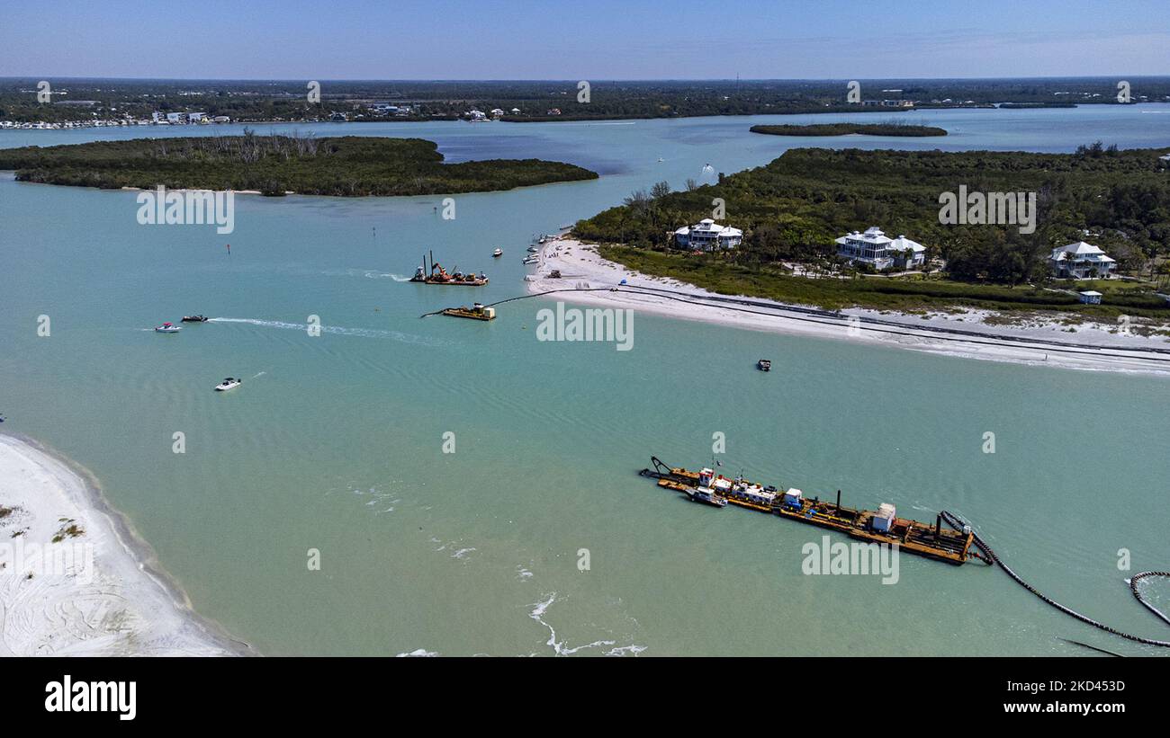 Barges are in place to dredge Stump Pass between Stump Pass Beach State ...