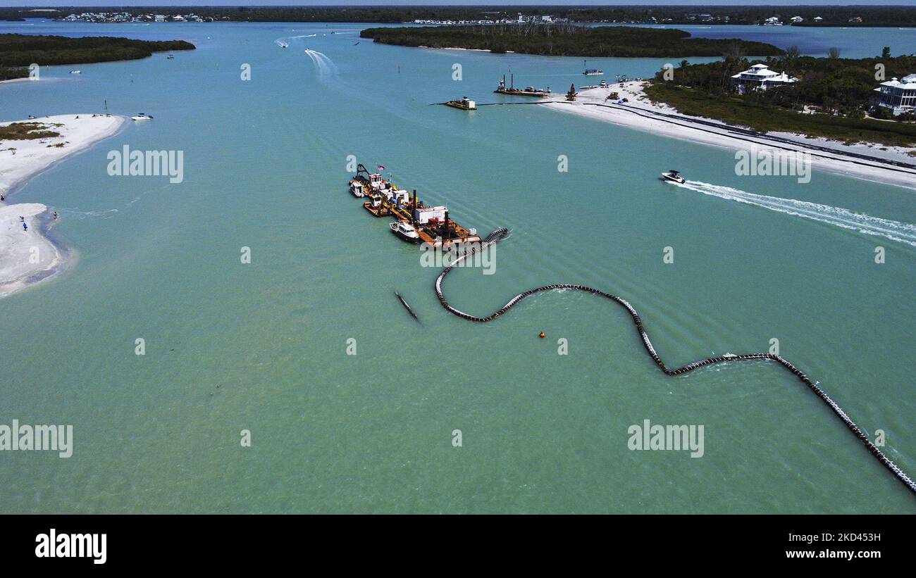 Barges are in place to dredge Stump Pass between Stump Pass Beach State ...