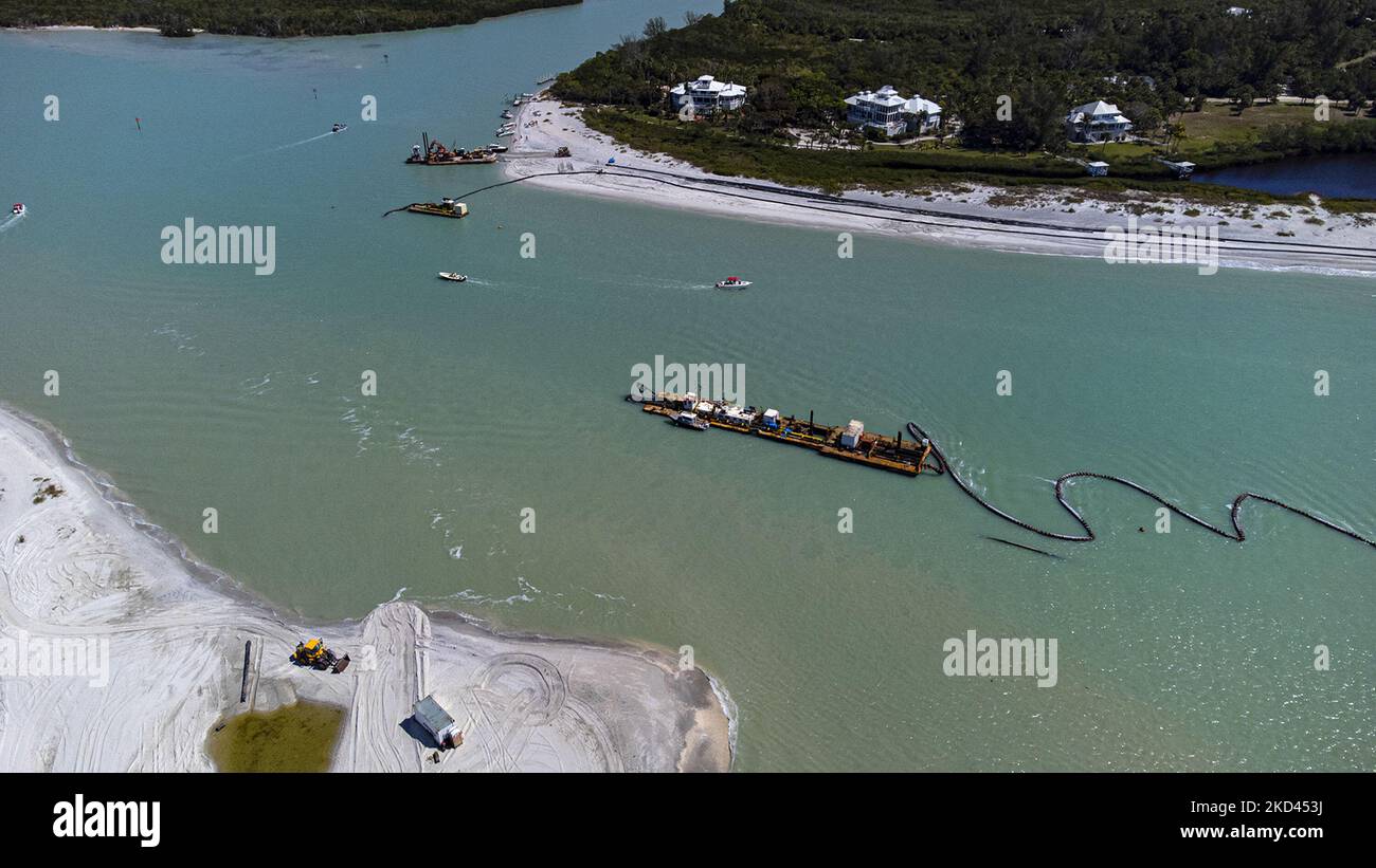 Barges are in place to dredge Stump Pass between Stump Pass Beach State ...