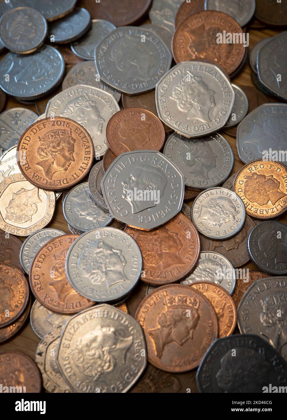 Loose change including the new Fifty pence piece featuring King Charles ...
