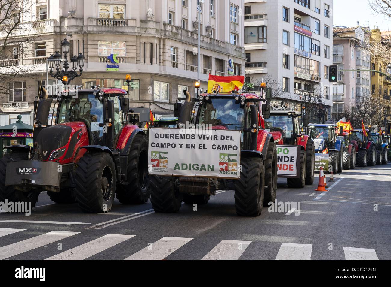 Tractors with banners during the farmers' protest for the low costs of ...