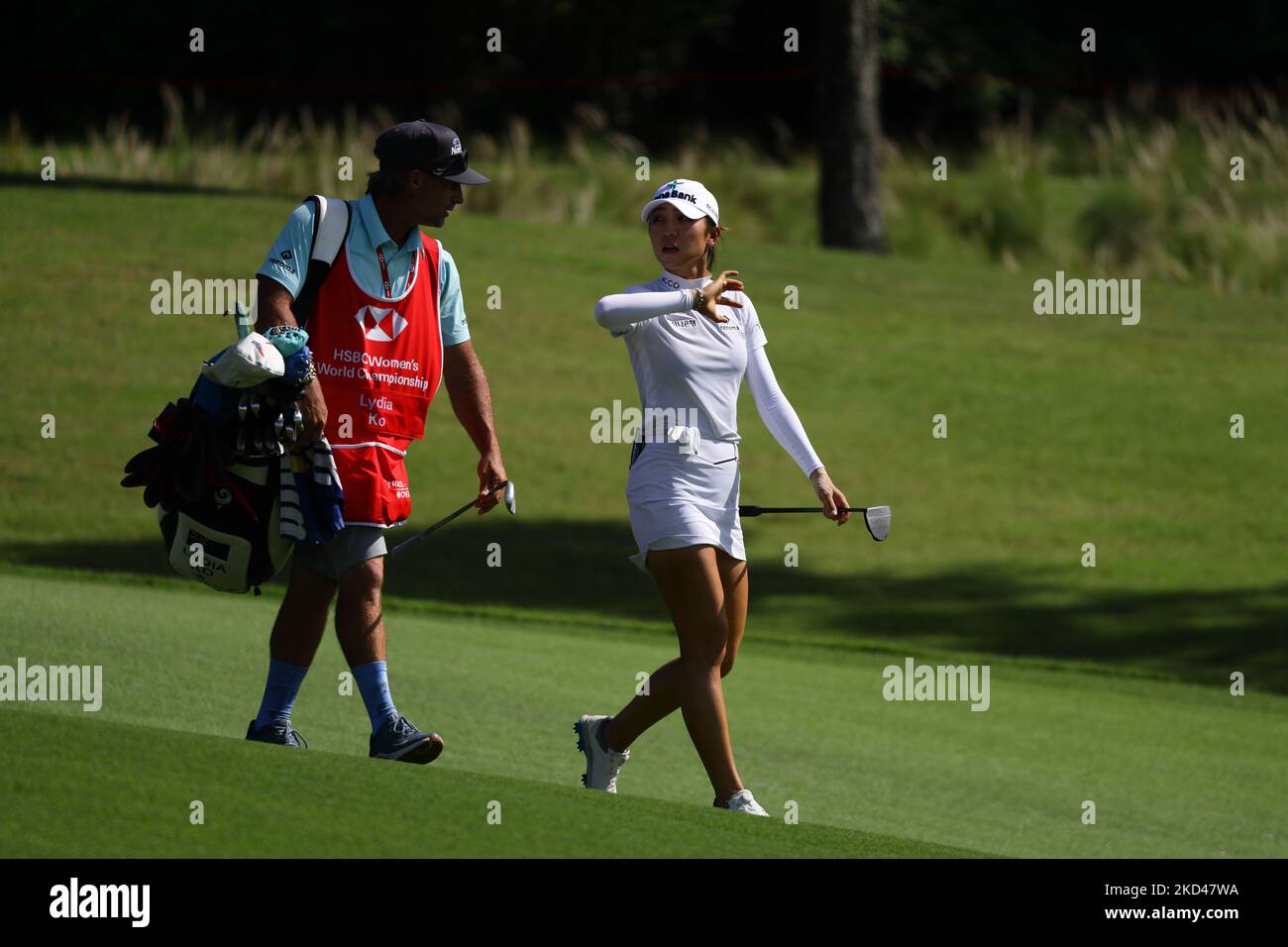 Lydia Ko of New Zealand chats with her caddie during round three of the ...