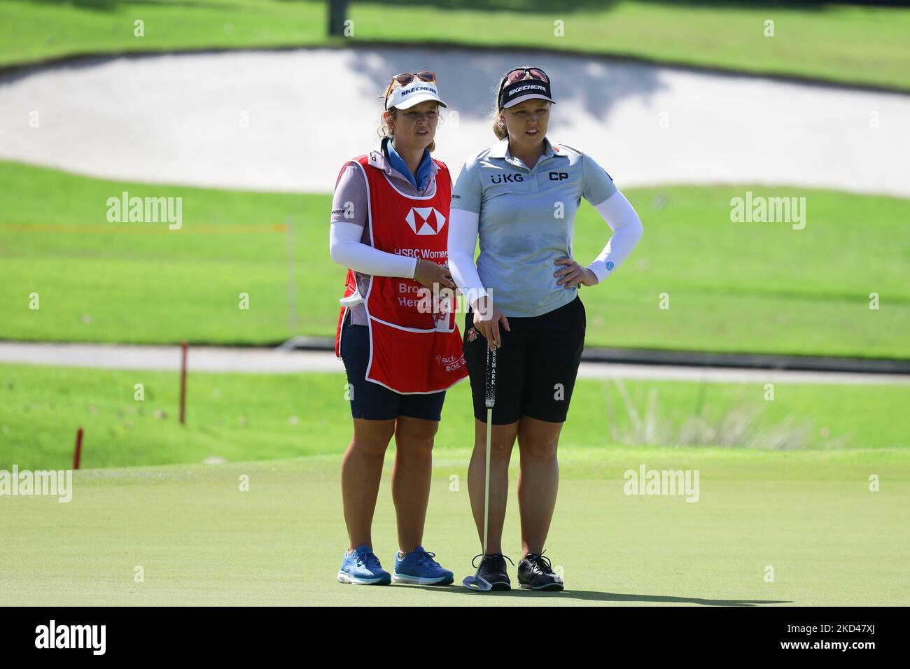 Brooke Henderson of Canada and her sister, caddie Brittany Henderson in ...