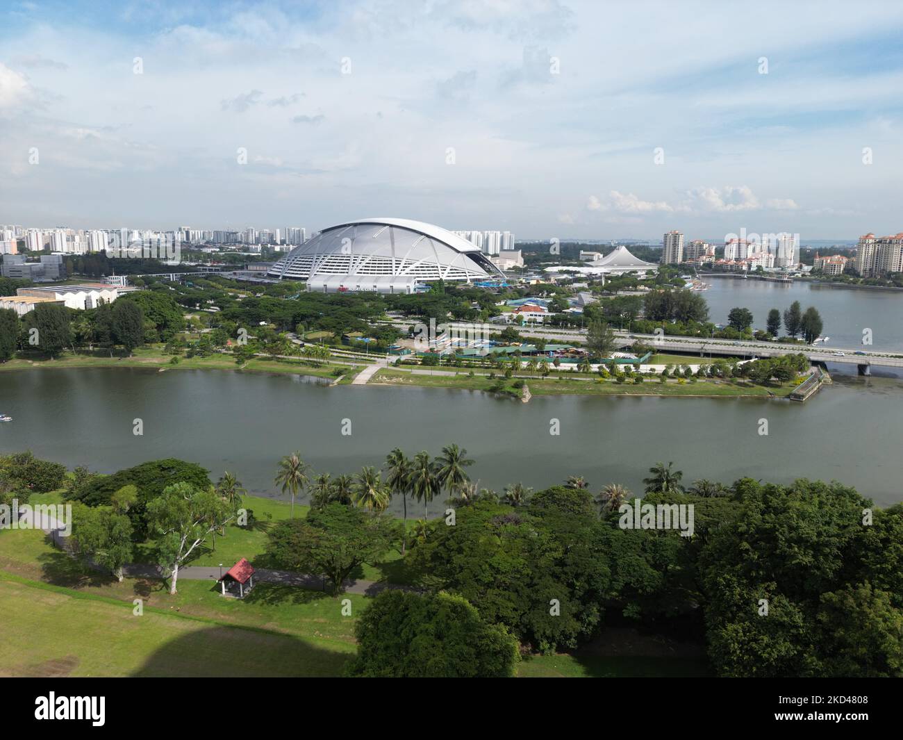 A high-angle of Kallang river view with a National stadium, cloudy sky ...