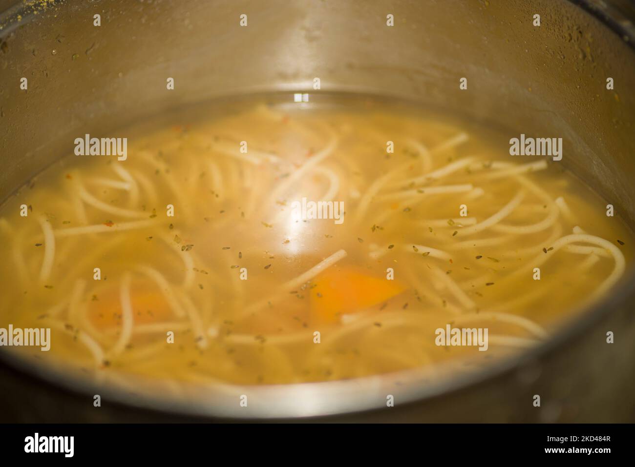 noodles boiling on the cooking pot Stock Photo - Alamy
