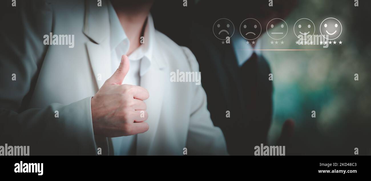 Businesswoman showing thumbs up for customer services satisfaction ...