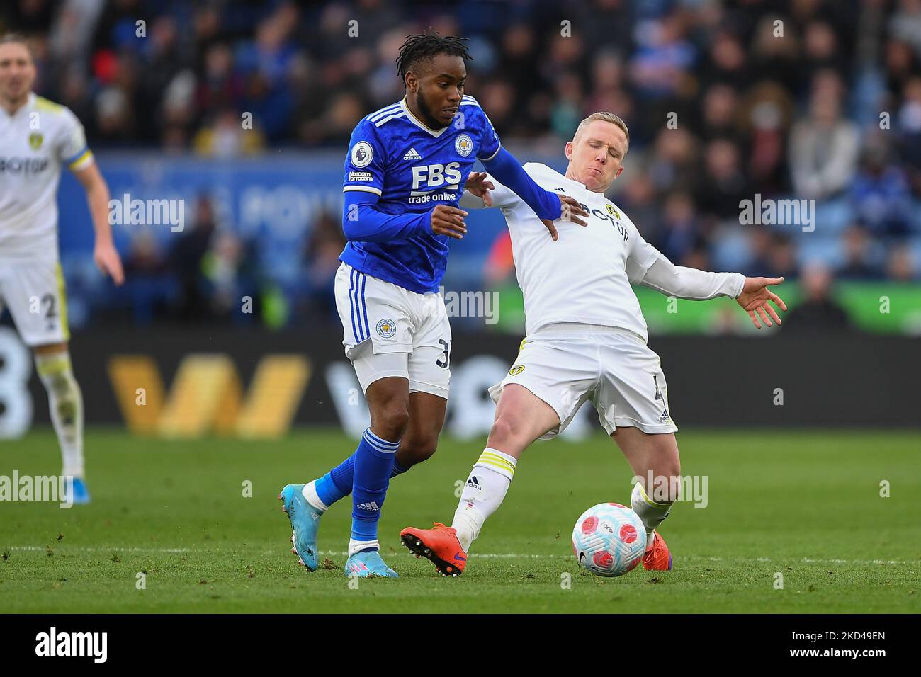 Ademola Lookman of Leicester City battles with Adam Forshaw of Leeds United during the Premier ...
