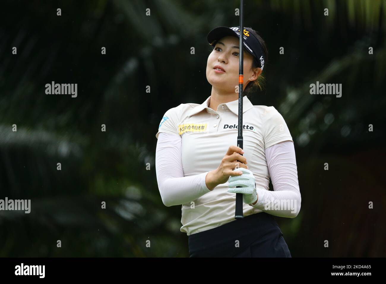 In Gee Chun of South Korea plays a shot during round four of the HSBC ...