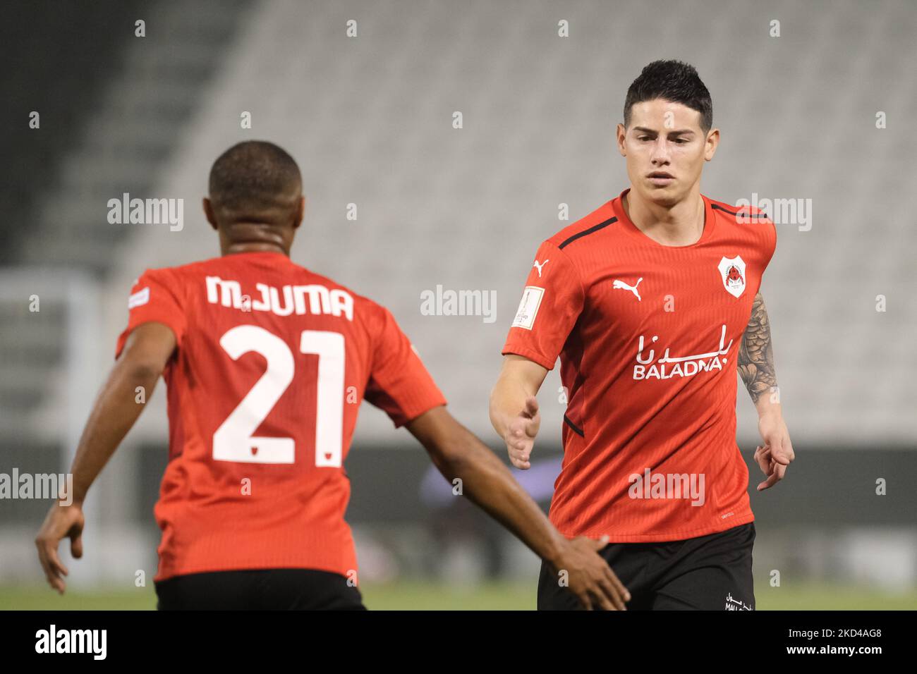 James Rodriguez (10) of Al Rayyan and teammate Mohammad Jumaa Mubarak ...