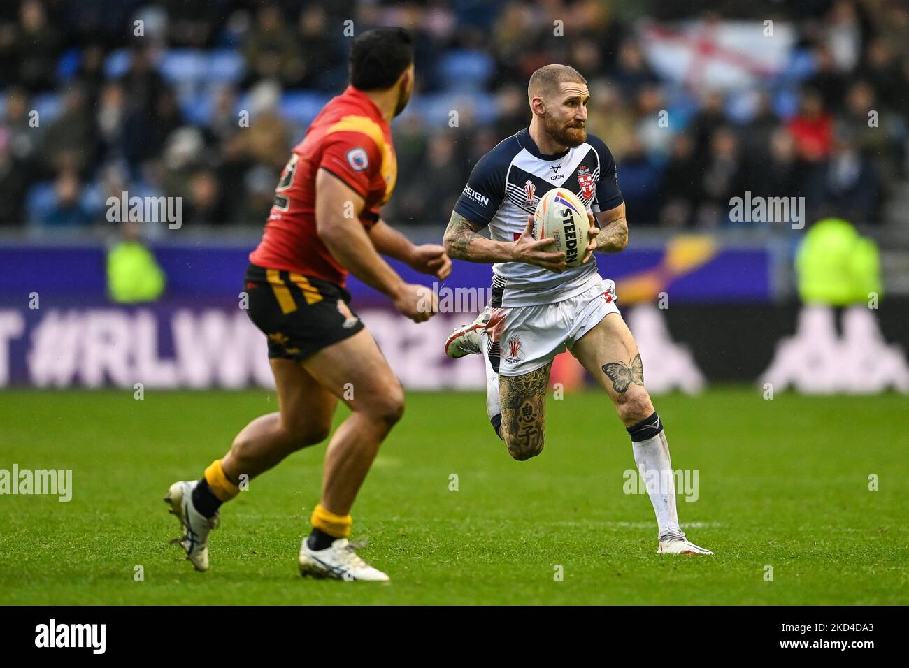 Sam Tomkins of England makes a break during the Rugby League World Cup ...