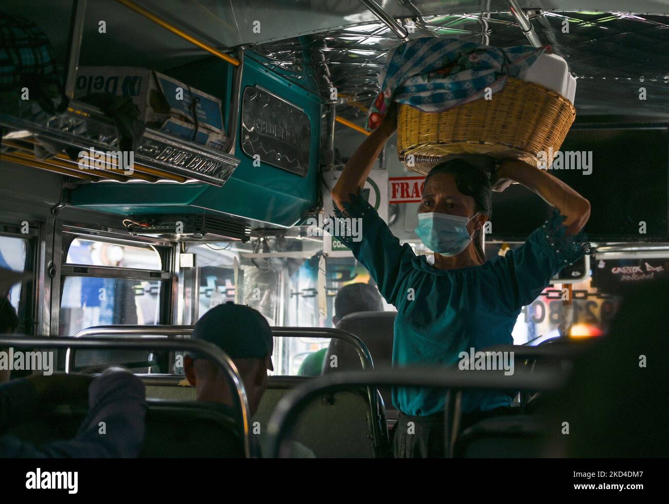 Food and snack vendor on the Chicken bus at the bus station in ...