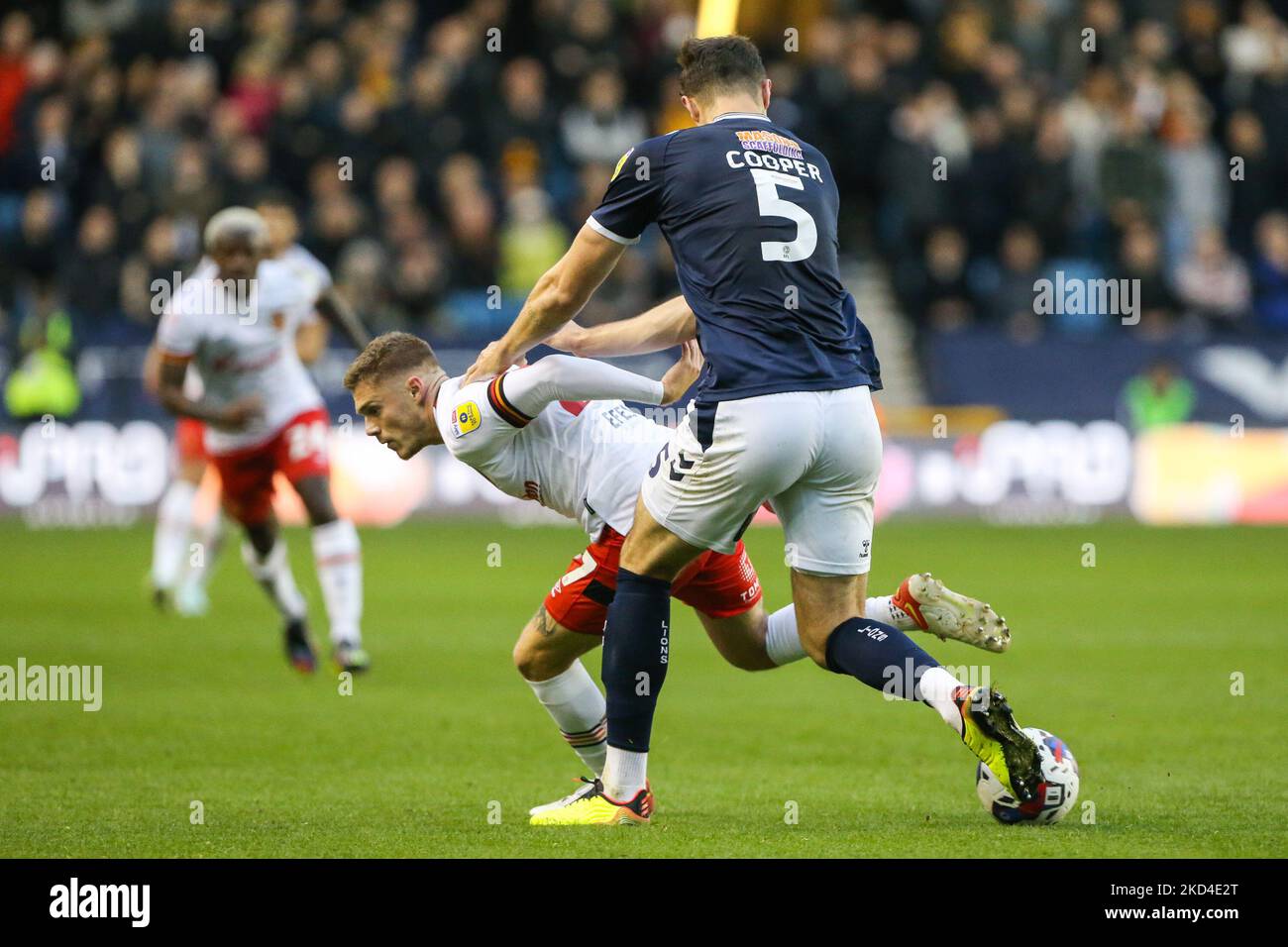 Regan Slater #27 of Hull City is tackled by Jake Cooper #5 of Millwall during the Sky Bet ...
